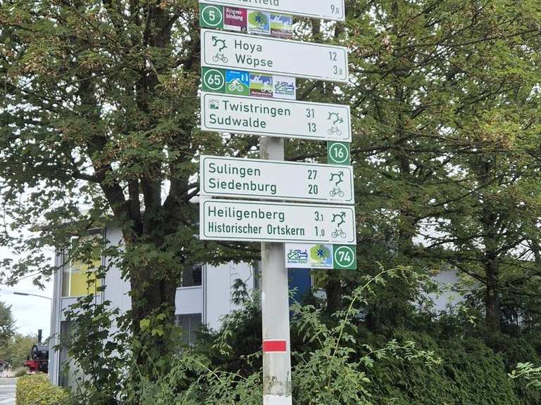 Junction 99 and cycle route signposts - Cycle Routes and Map | Komoot