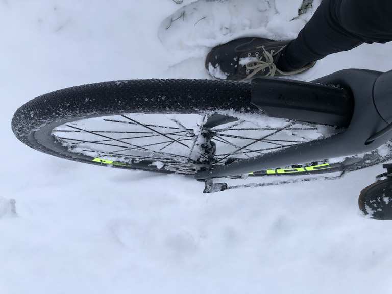 Snow-covered field path in fog - Road Cycle Routes and Map | Komoot